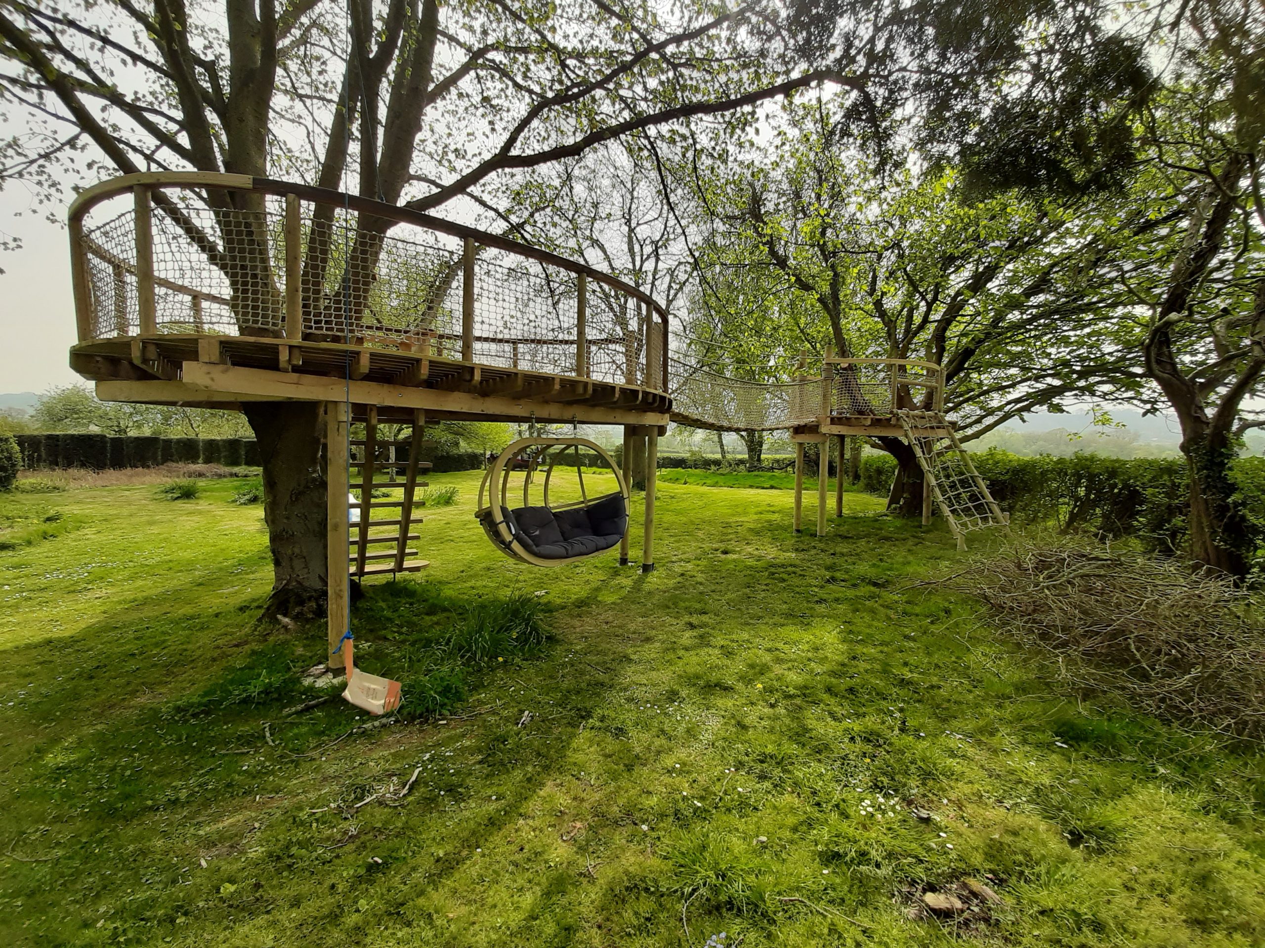 Double Platform with Rope Bridge | The Wooden Treehouse Company